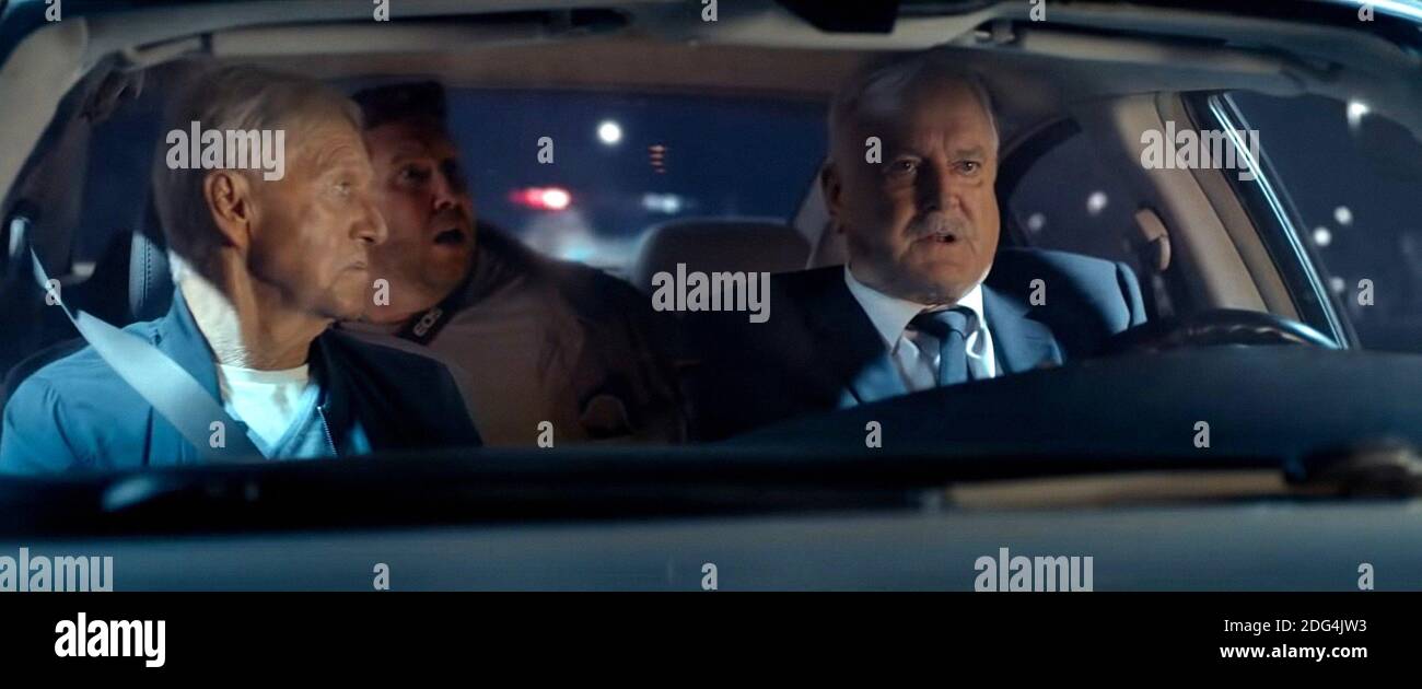 THE VERY EXCELLENT MR. DUNDEE, from left: Paul Hogan, Nate Torrence, John Cleese, 2020 ...