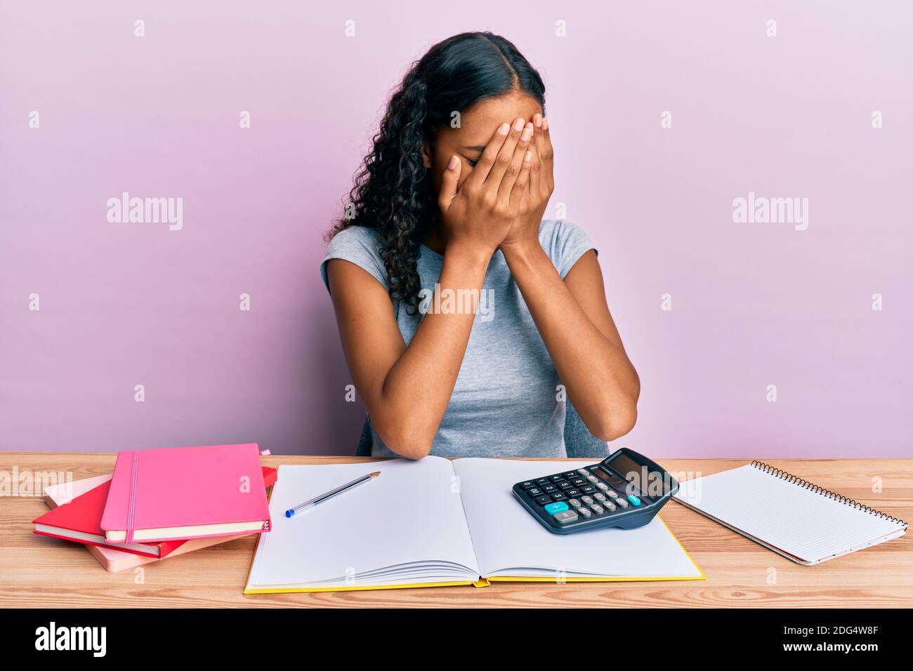 Young african american girl accountant working at the office with sad ...