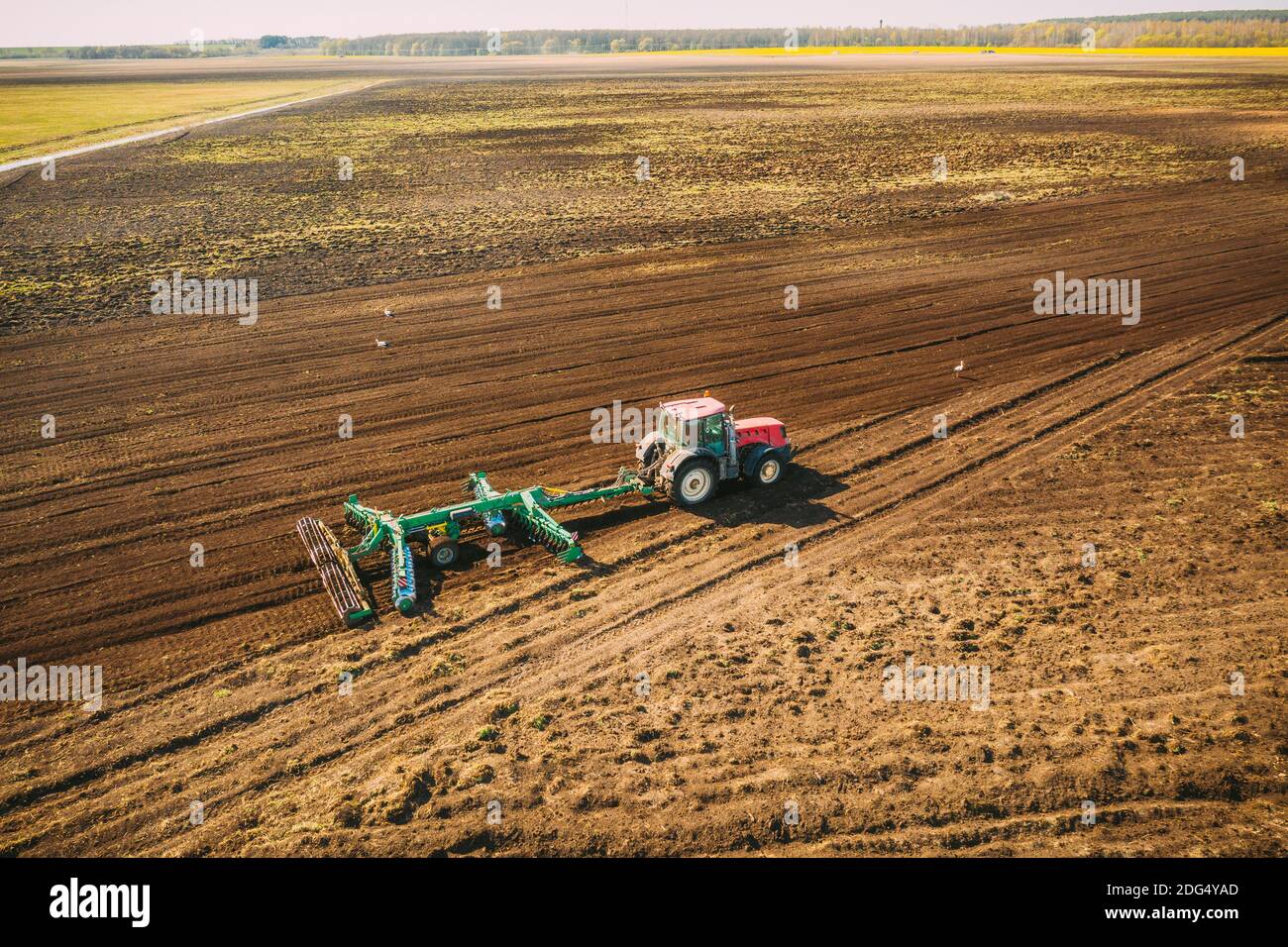 Aerial View. Tractor Plowing Field. Beginning Of Agricultural Spring ...
