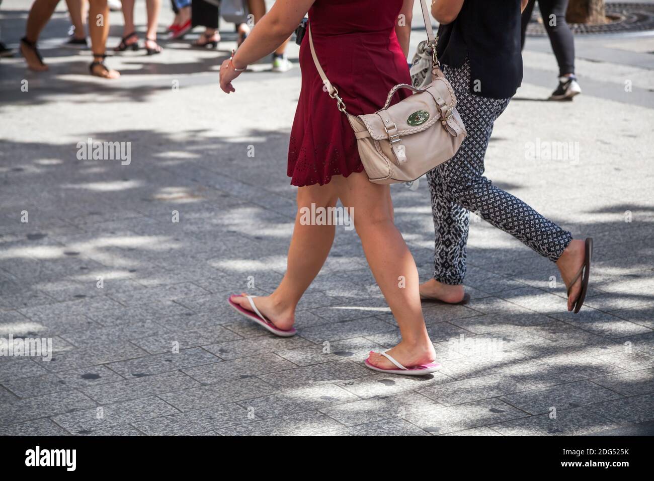 Legs of women who are at summer on the move in the city Stock Photo - Alamy