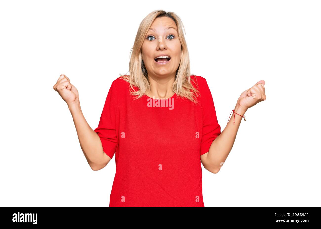 Middle Age Caucasian Woman Wearing Casual Clothes Celebrating Surprised