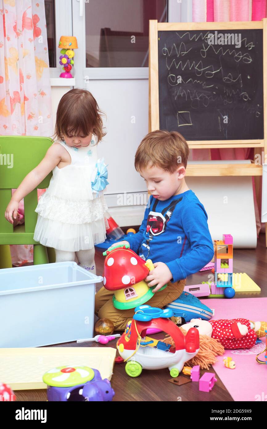 Children playing with toys at home Stock Photo - Alamy