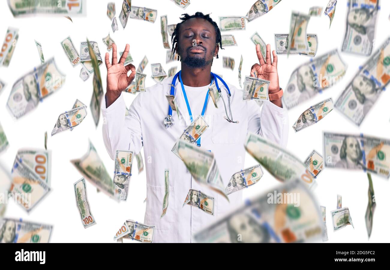 Young african american man with braids wearing doctor stethoscope and ...