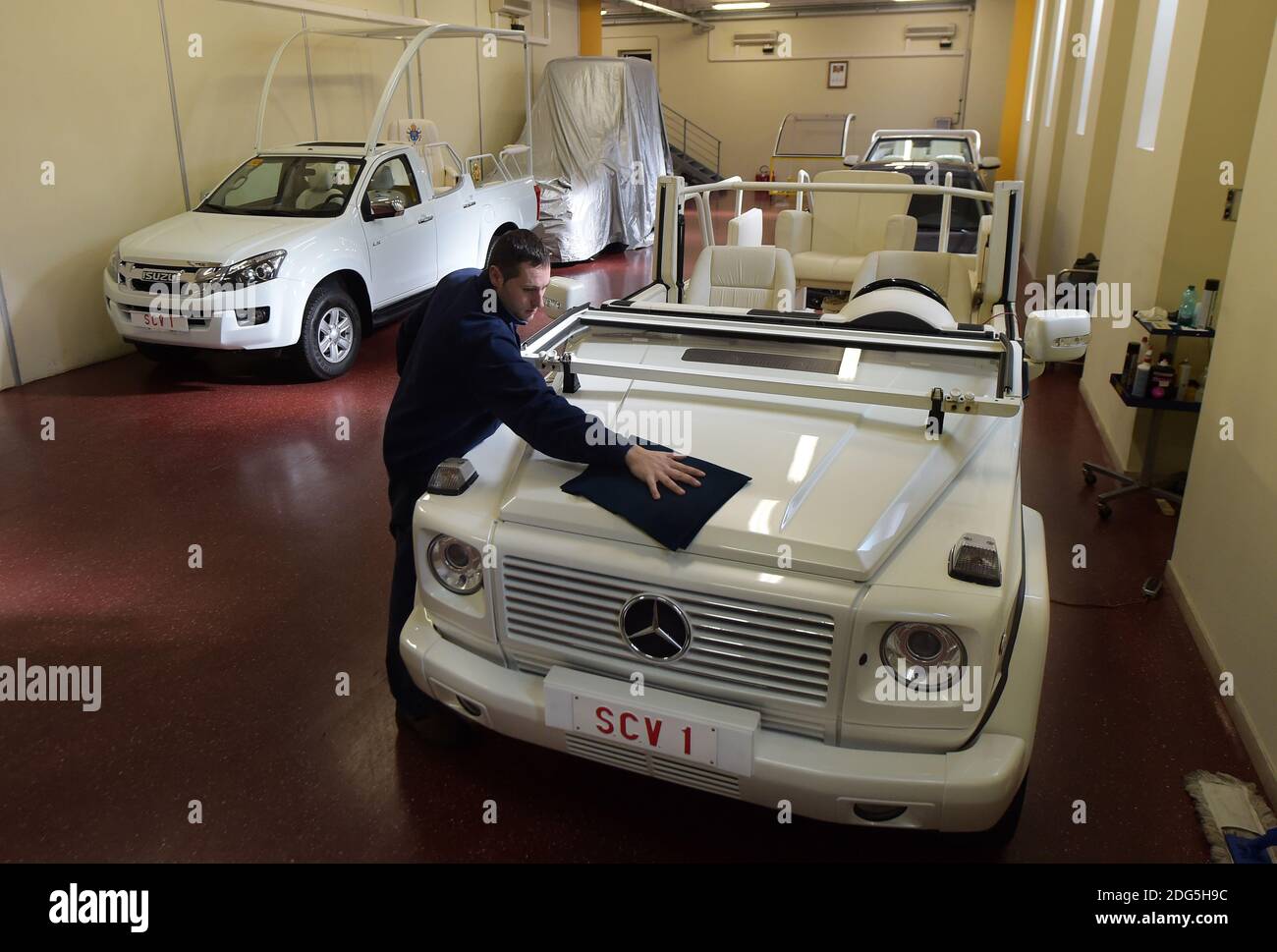 Manuel washes the papamobile at the Vatican on October 2016. Inside the ...