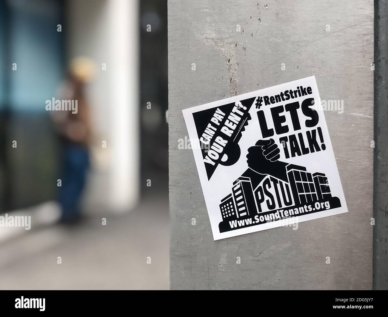 Seattle, USA. 21th Apr, 2020. Late in the day a rent strike sticker ...