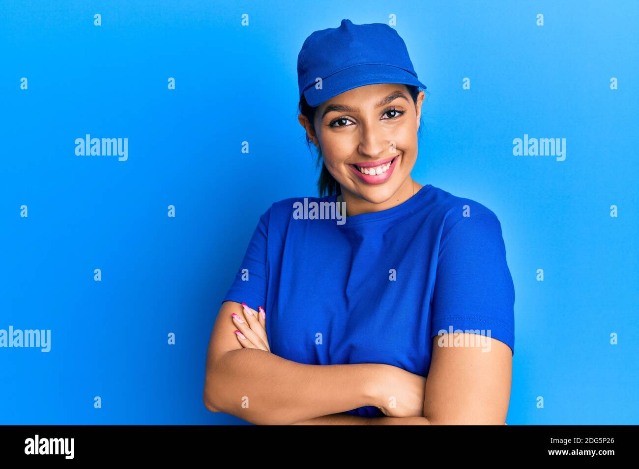 Beautiful brunette woman wearing delivery uniform happy face smiling ...