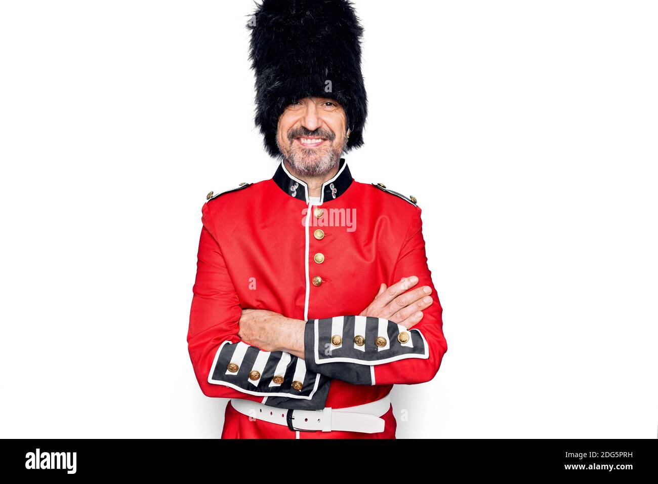 Middle age handsome wales guard man wearing traditional uniform over ...