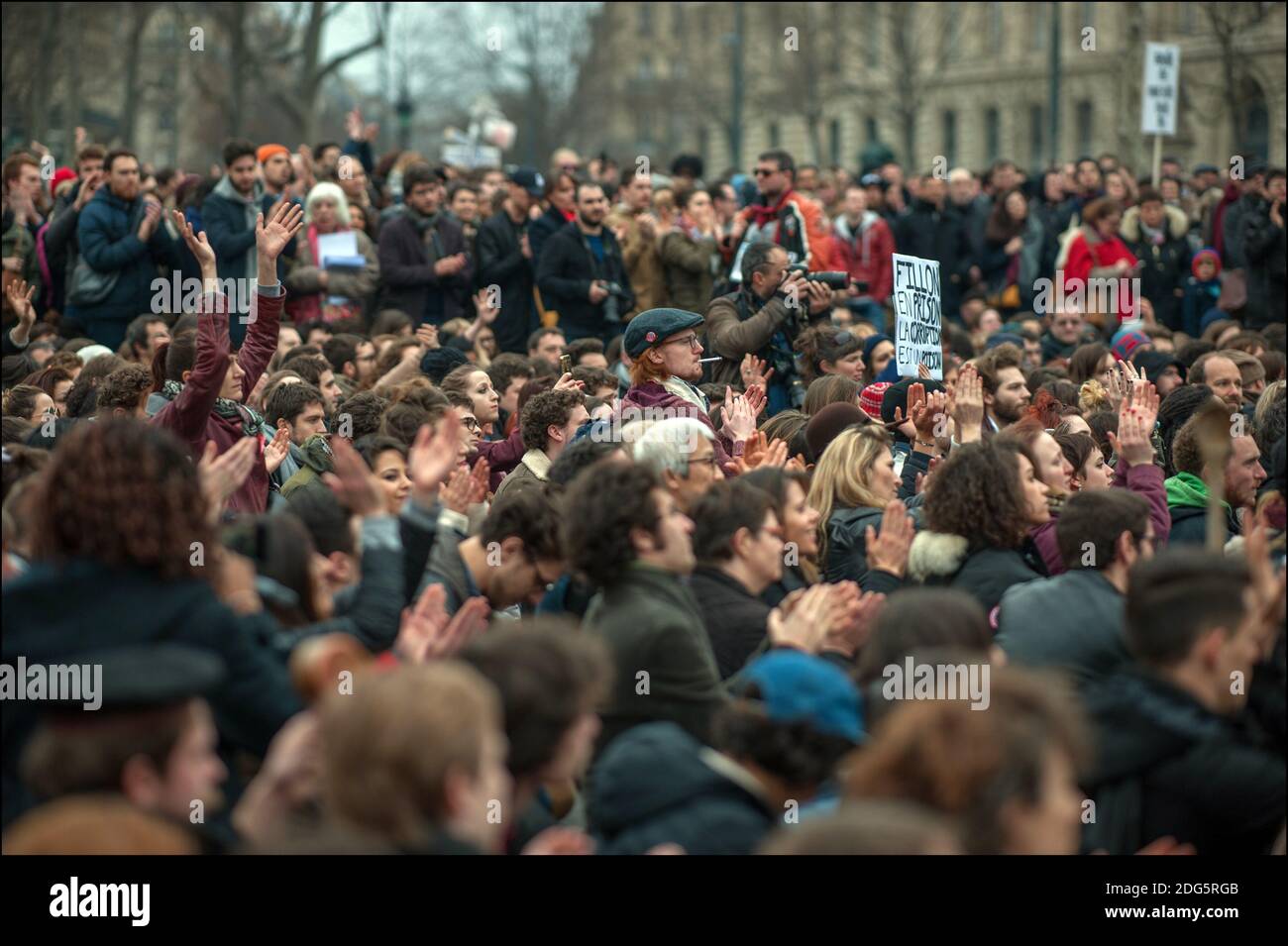 People participate in a protest against political corruption at Place ...