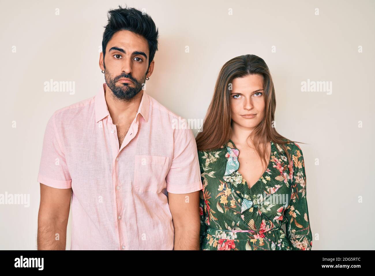 Beautiful young couple of boyfriend and girlfriend together depressed ...