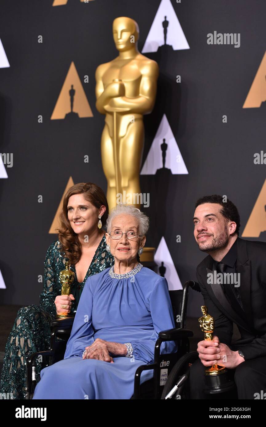 Caroline Waterlow, Katherine Johnson and Ezra Edelman pose in the press ...