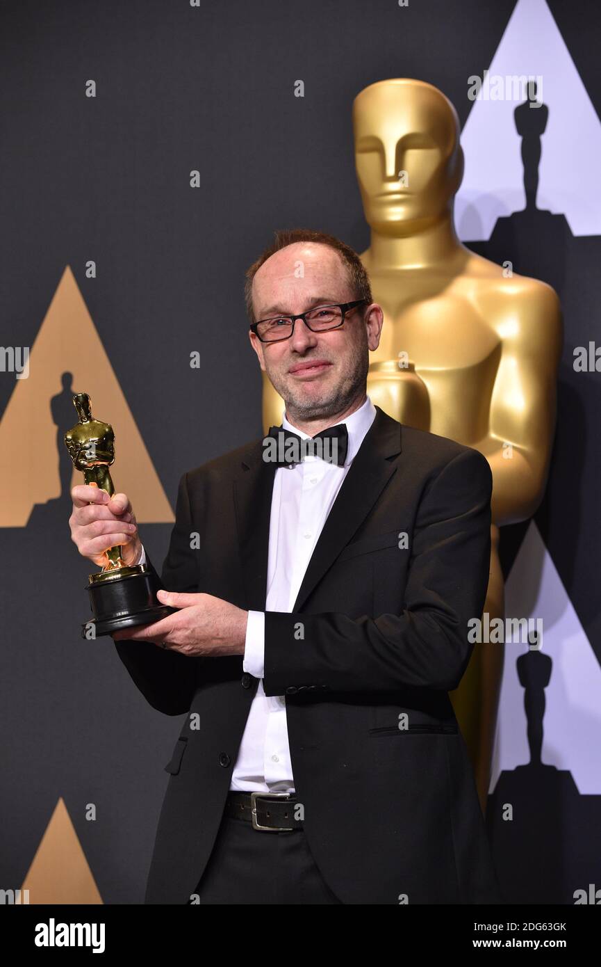 Editor John Gilbert, winner of Best Film Editing for 'Hacksaw Ridge ...