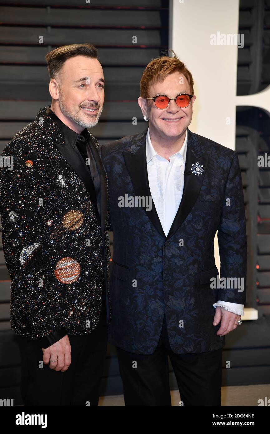 Elton John (R) and David Furnish attending Vanity Fair Oscar Party 2017 ...
