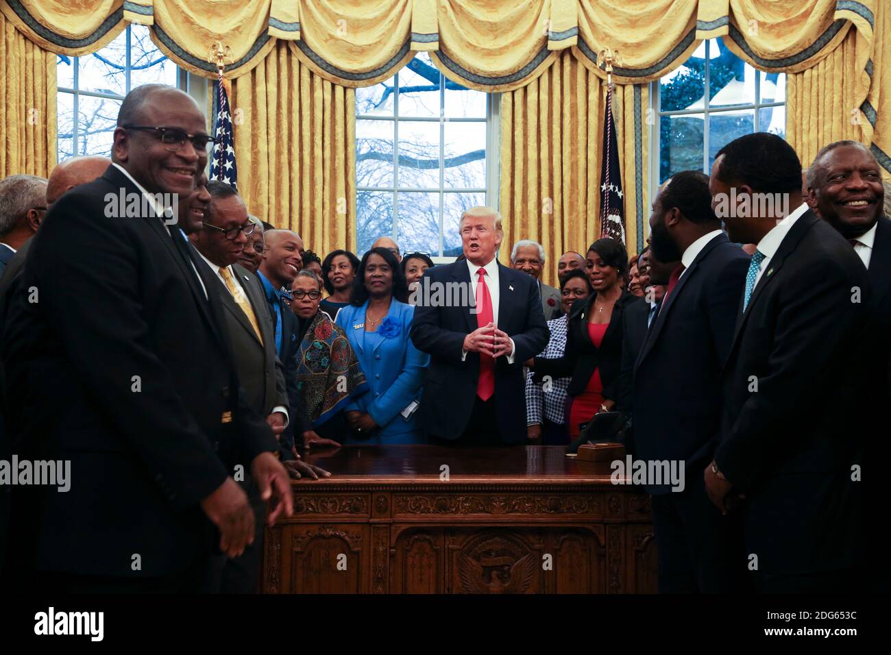 U.S. President Donald Trump poses with members of the Historically ...