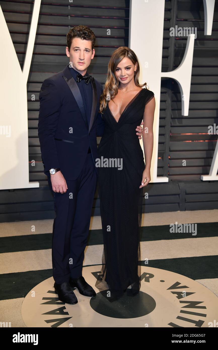 Miles Teller and Keleigh Sperry arriving at the Vanity Fair Oscar Party ...