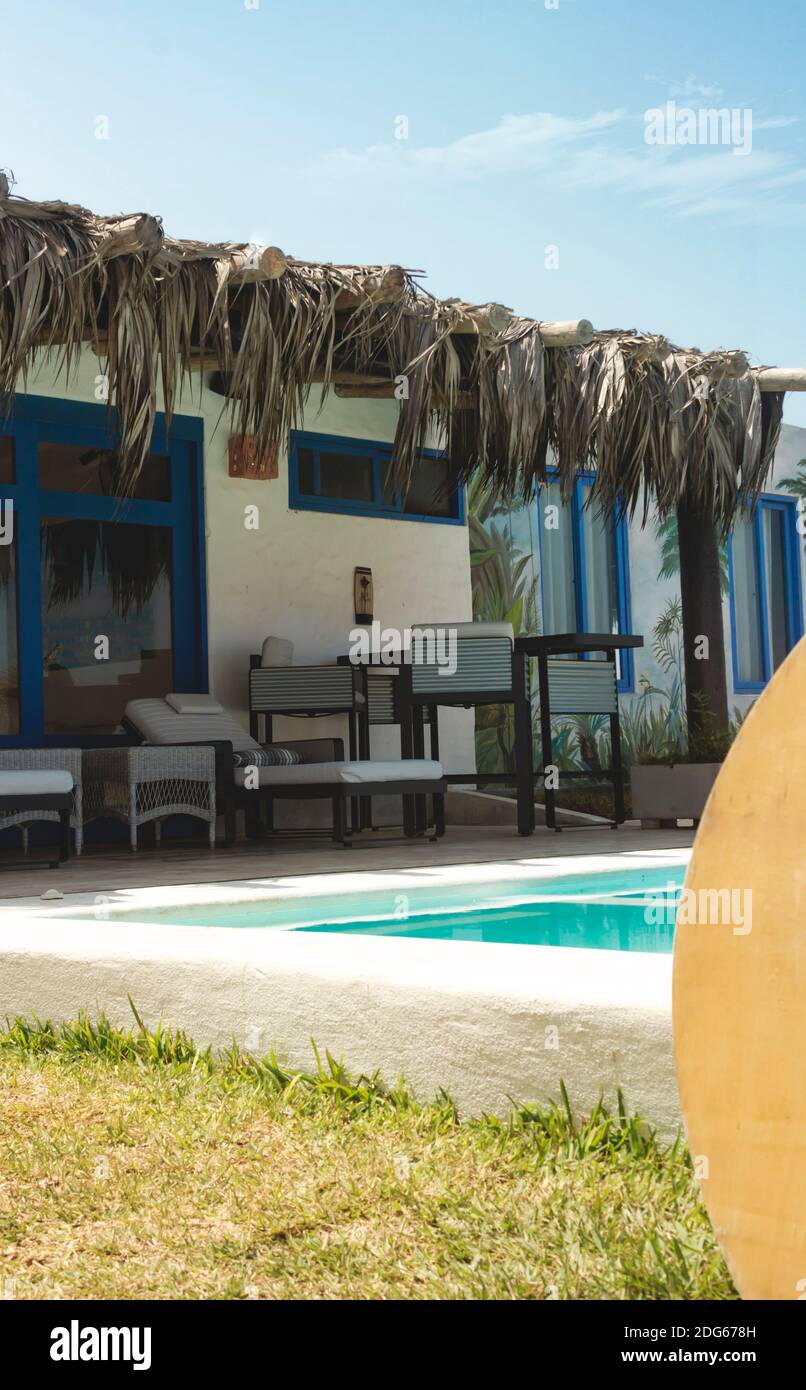 Relaxing summer house on the beach with pool Stock Photo - Alamy