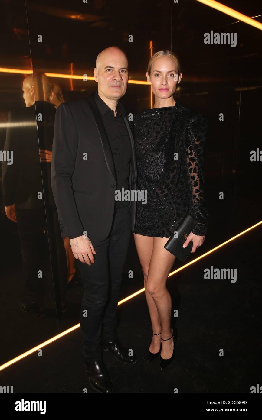 Stephan Bezy and Amber Valletta arriving at the YSL Beauty party during ...