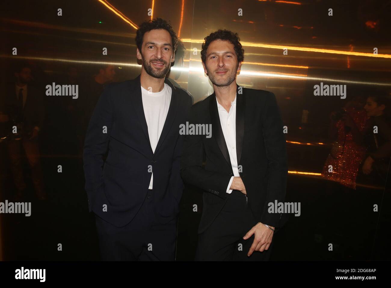 Simon Buret and Olivier Coursier (AaRON) arriving at the YSL Beauty ...