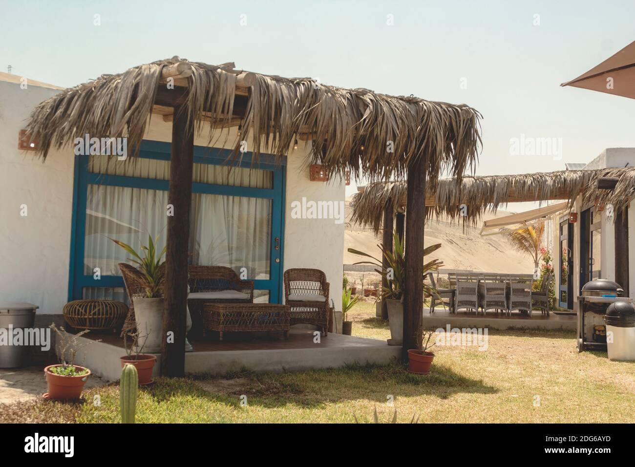 Relaxing summer house on the beach with pool Stock Photo - Alamy