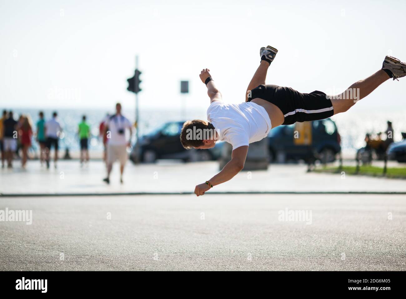 Urban acrobatics with somersault Stock Photo - Alamy