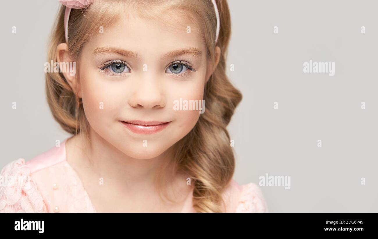 Little pretty girl portrait. Studio shot. Cute kid face Stock Photo - Alamy