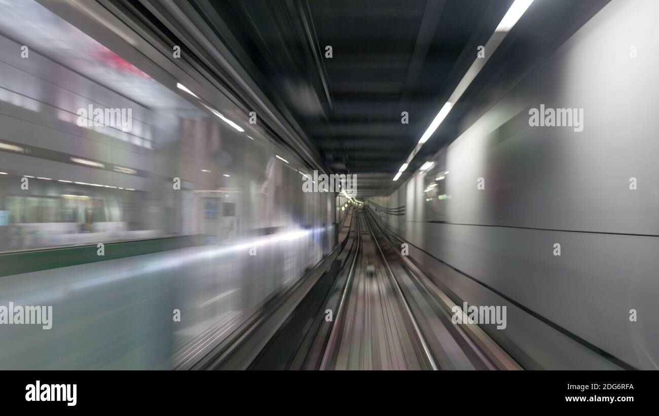 Moving subway train Stock Photo - Alamy