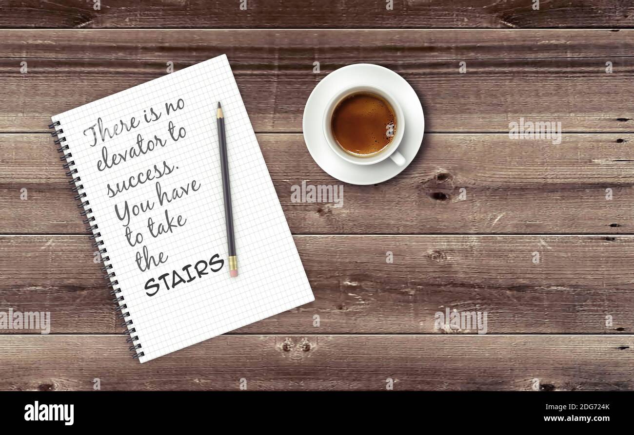 Inspirational quote on notepad Stock Photo - Alamy