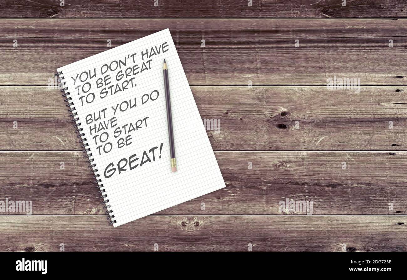 Inspirational quote on notepad Stock Photo - Alamy