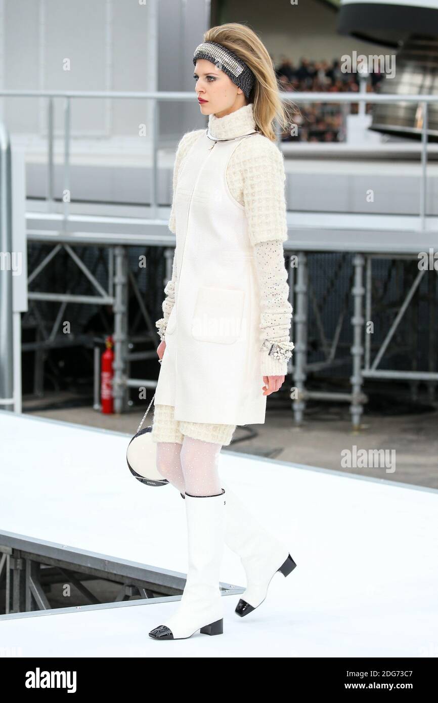 A model walks on the runway during the Chanel Fashion Show at FW17 held ...