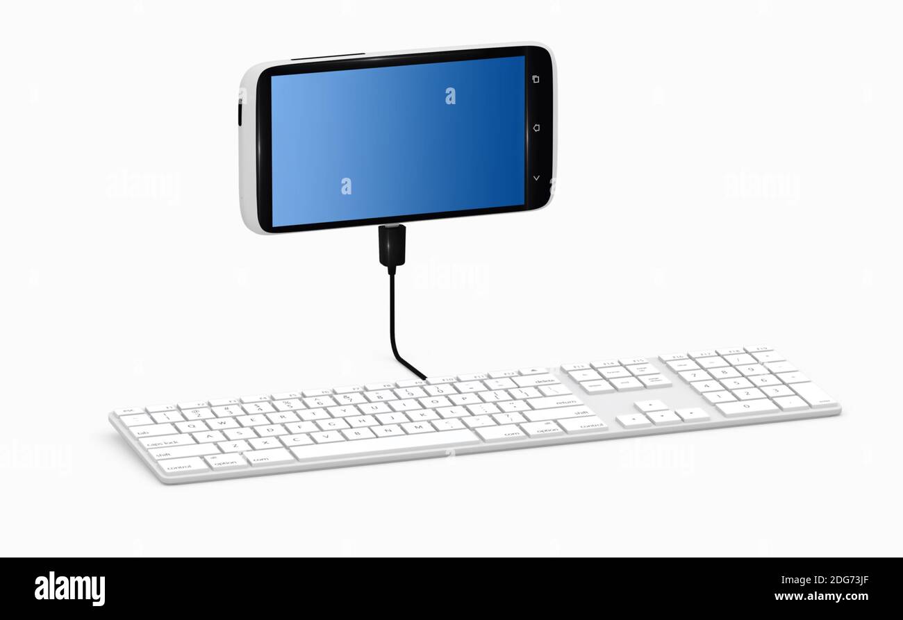 Smartphone connected to keyboard Stock Photo - Alamy