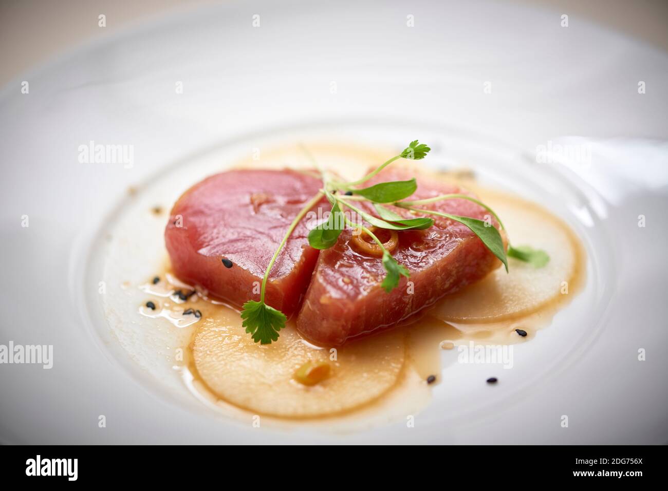 Fresh Tuna dish served in a restaurant Stock Photo - Alamy