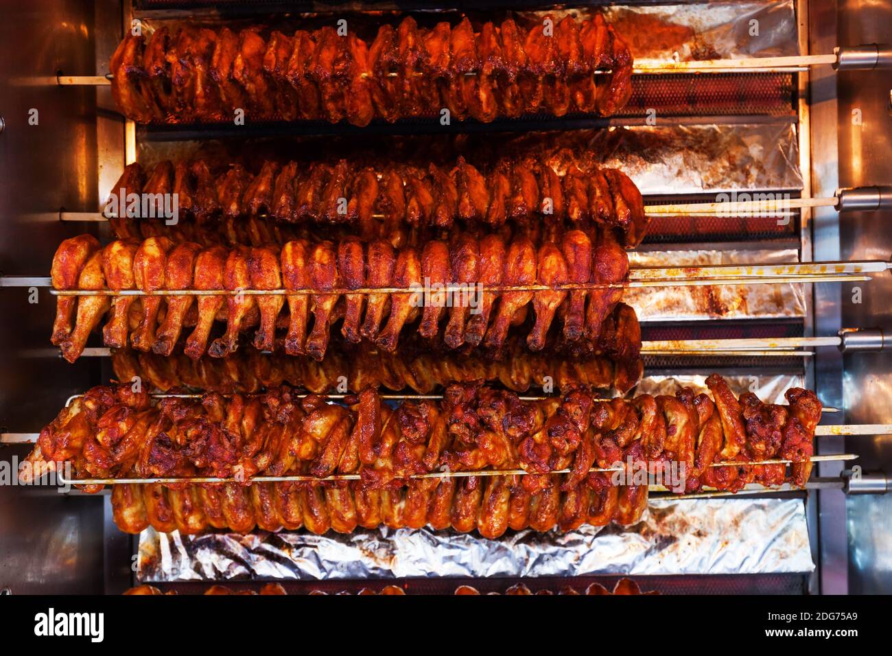 Chicken wings at a grill stall Stock Photo - Alamy