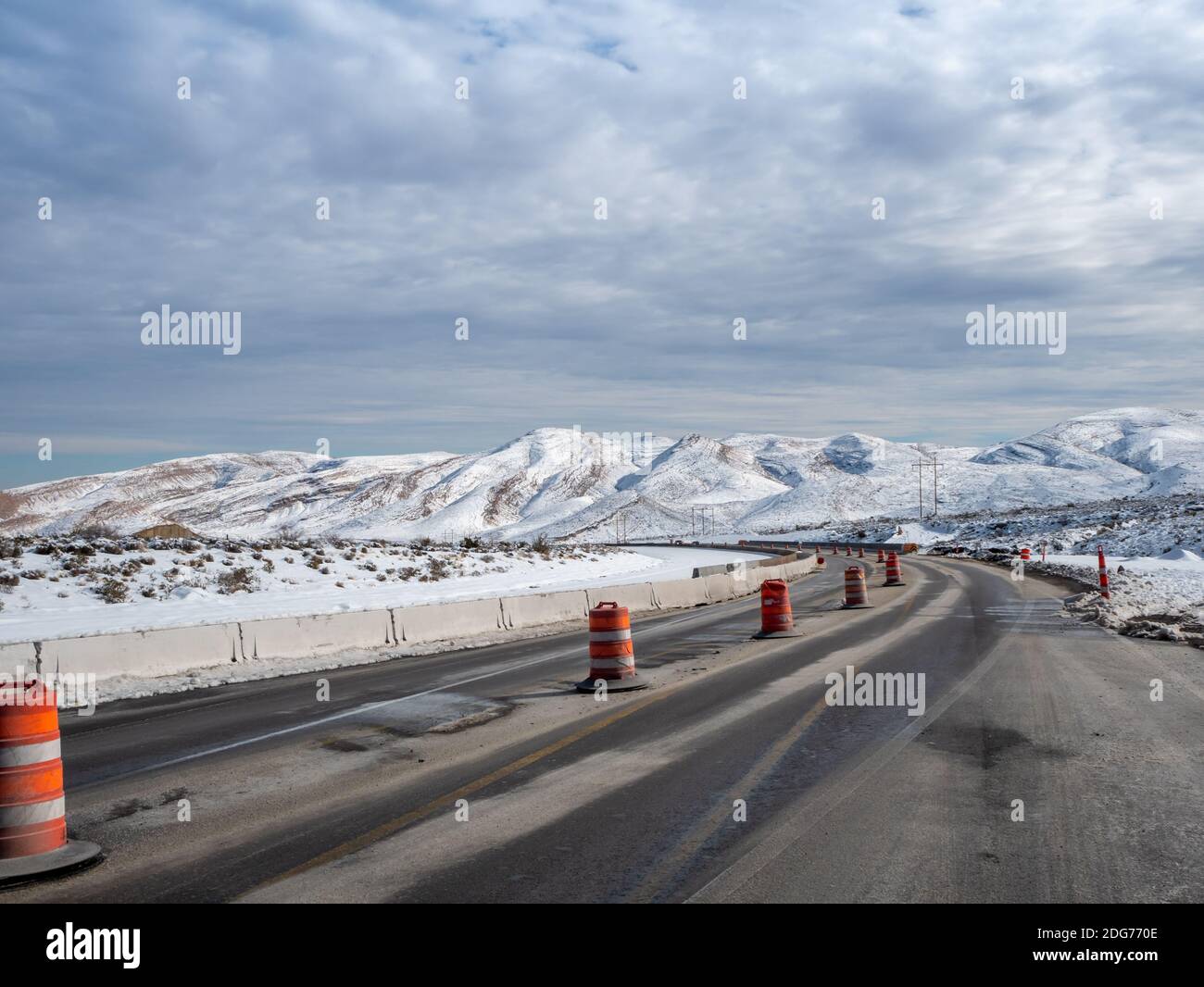 Desert snowfall along a highway with road construction Stock Photo - Alamy