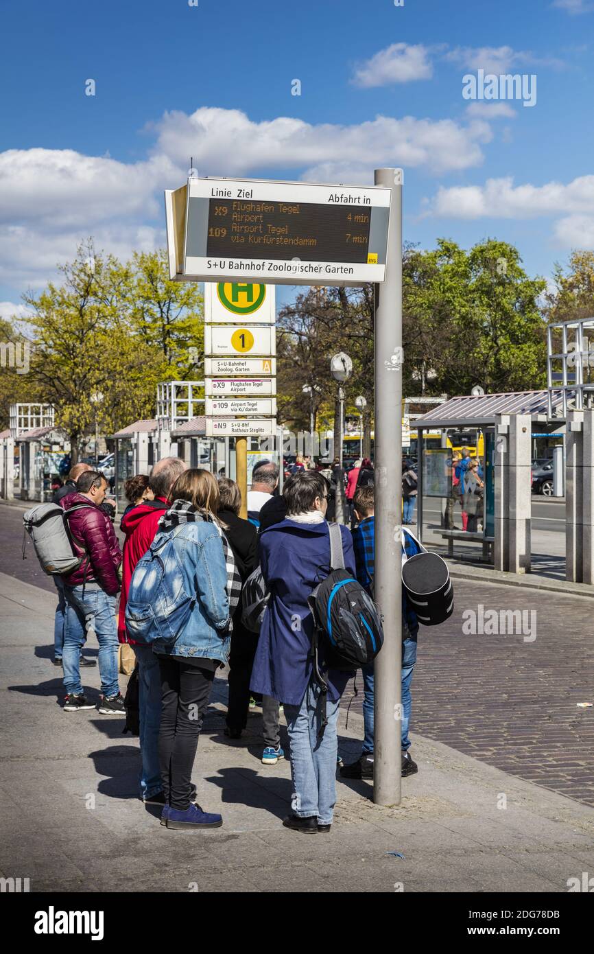 At the bus stop Stock Photo - Alamy