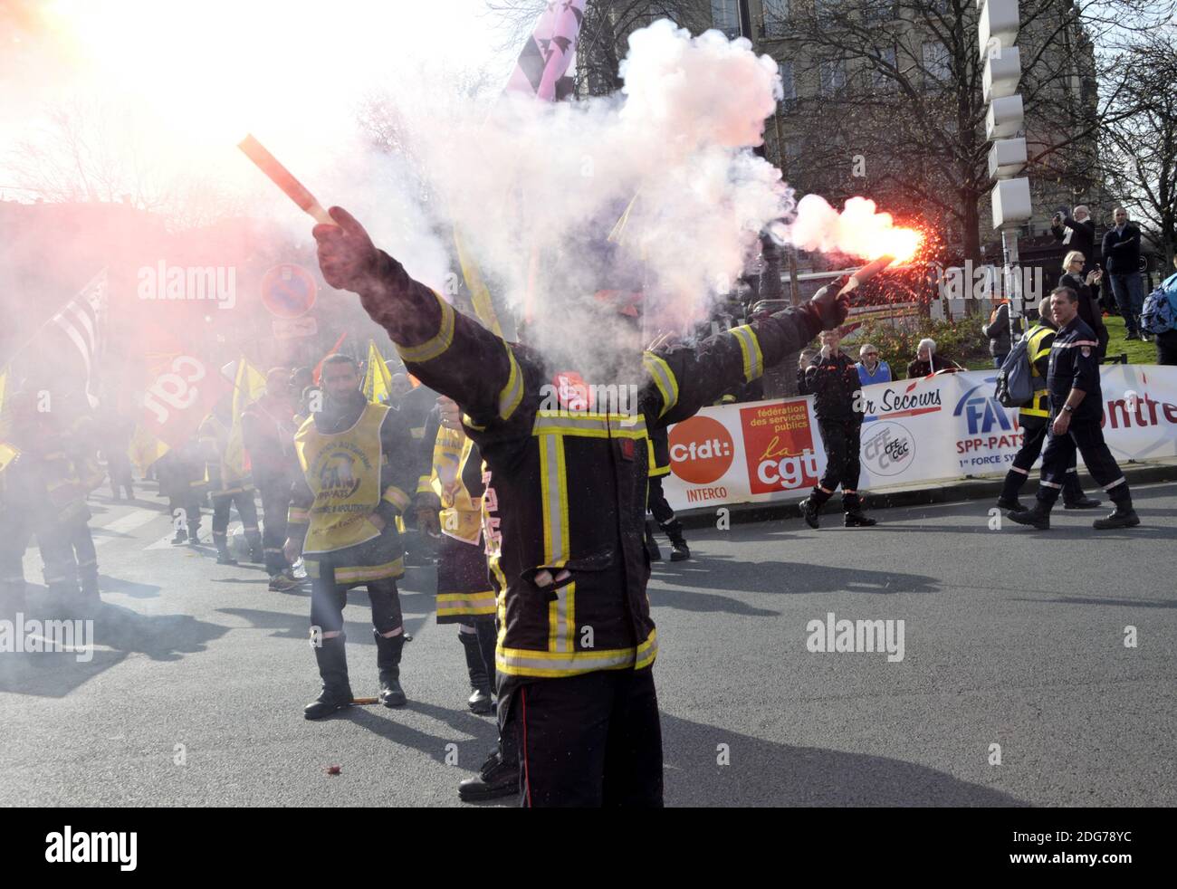 Firefighters march during a demonstration of French firemen against ...