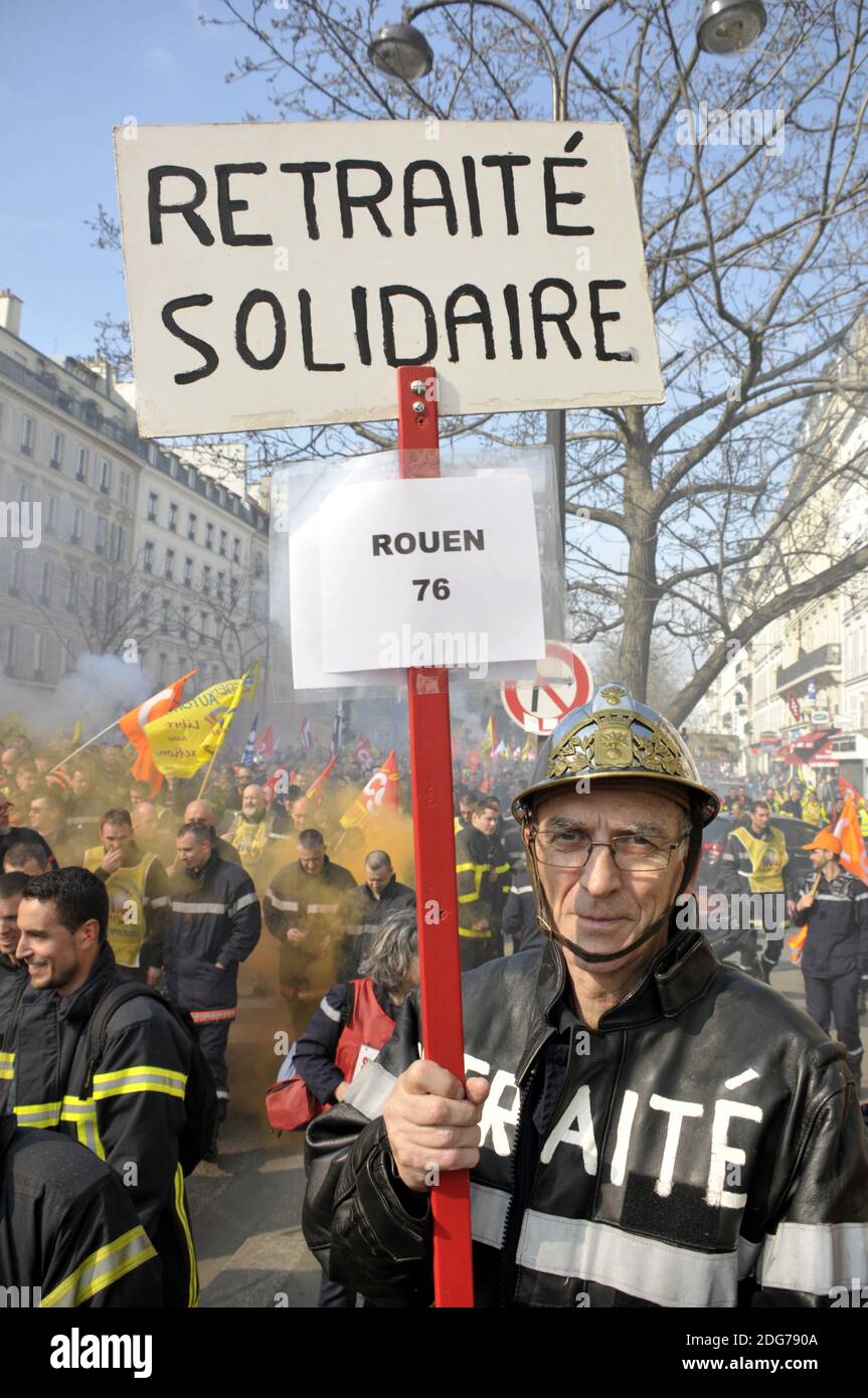 Firefighters march during a demonstration of French firemen against ...