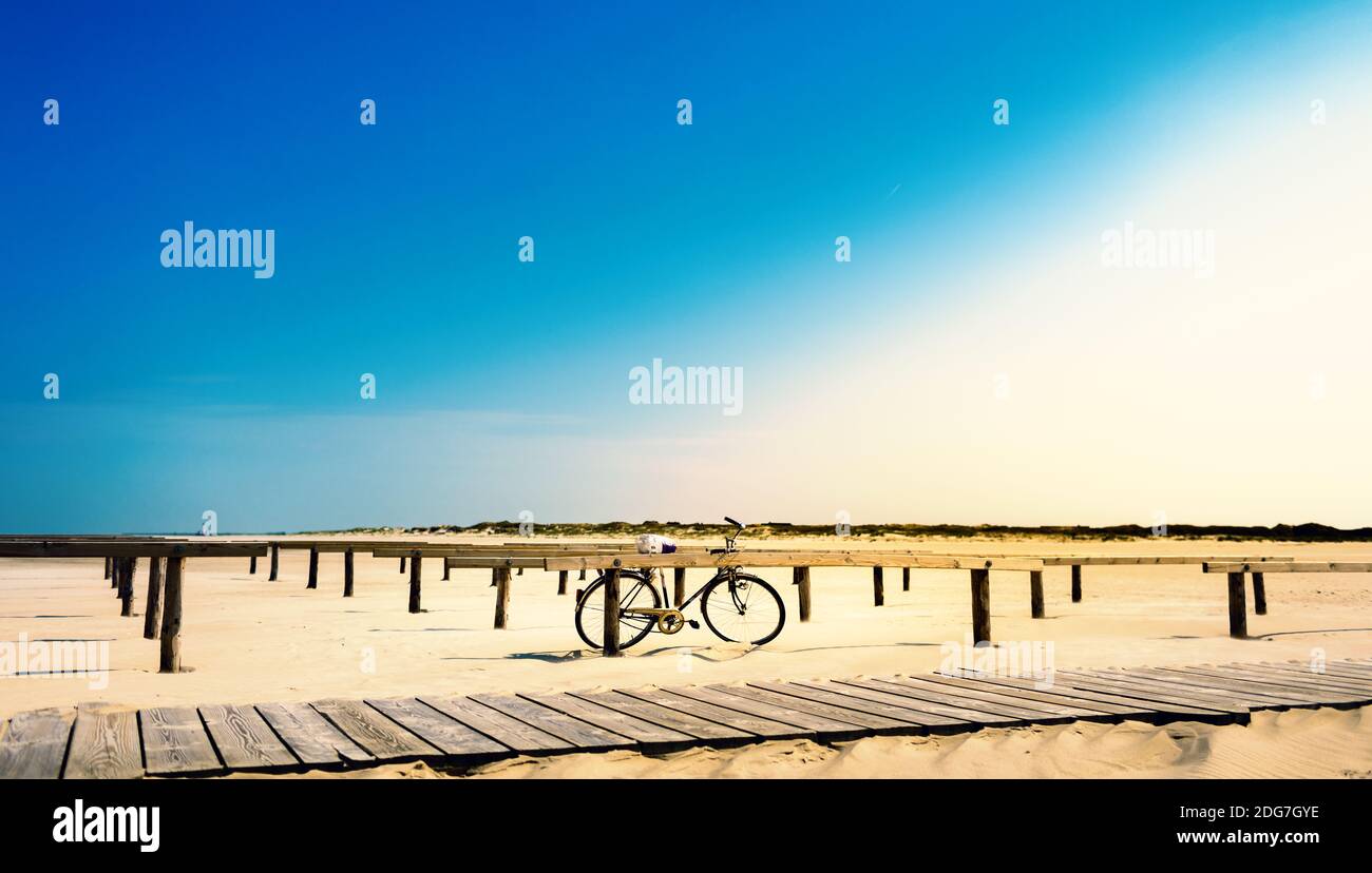Bicycle on the beach Stock Photo - Alamy