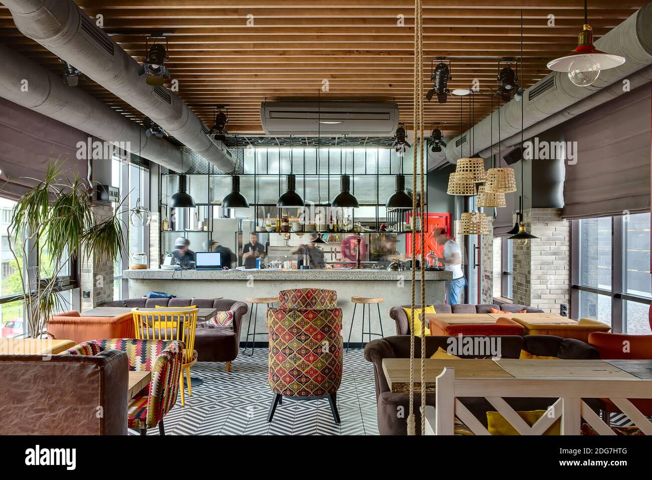 Restaurant with open kitchen Stock Photo - Alamy