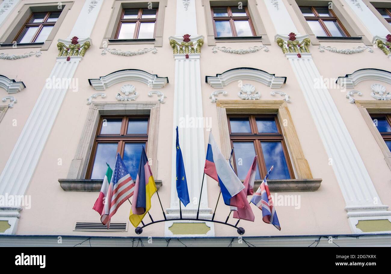 Facade old building flags hi-res stock photography and images - Alamy