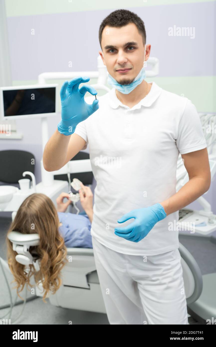 Dentist in dentistry Stock Photo - Alamy