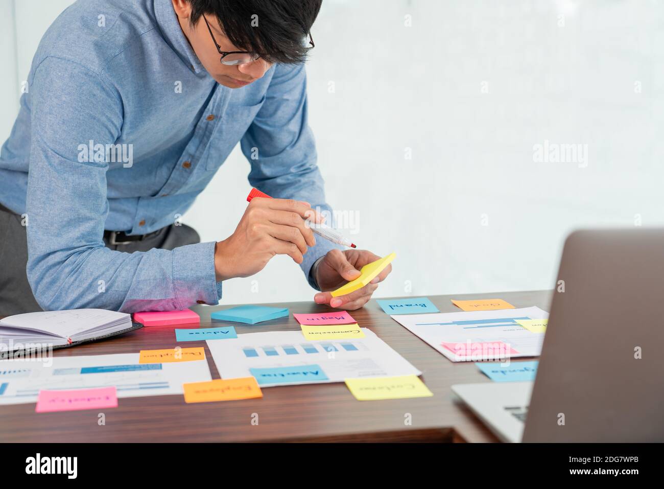 Creative group of business people brainstorming use sticky notes ...