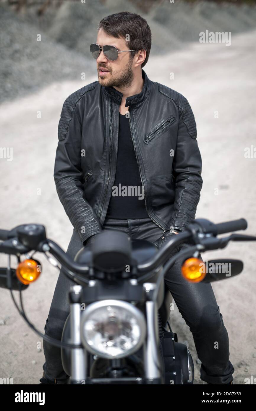 Cool man on the motorcycle Stock Photo - Alamy