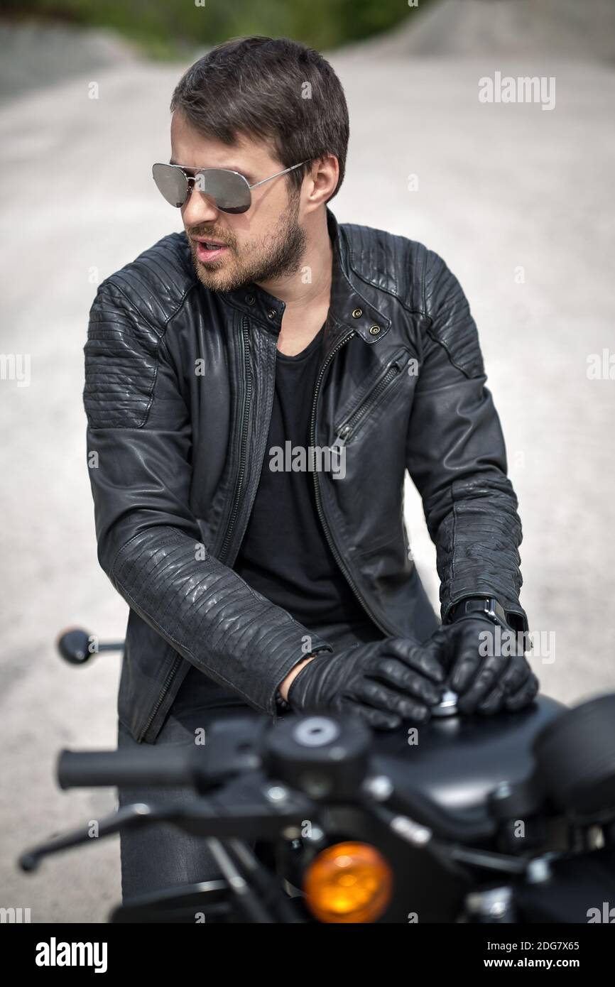 Cool man on the motorcycle Stock Photo - Alamy