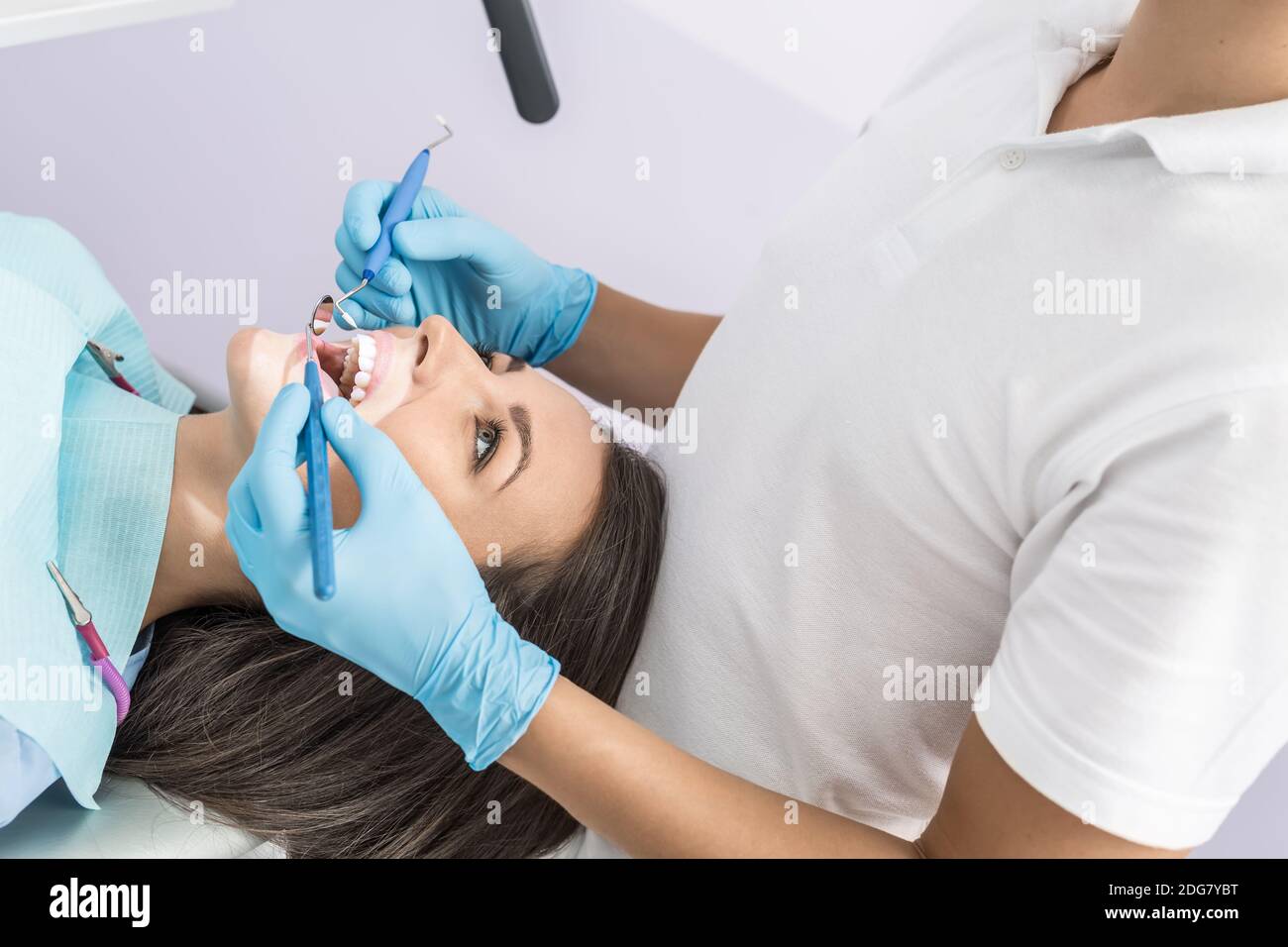Girl at dentist's office Stock Photo - Alamy