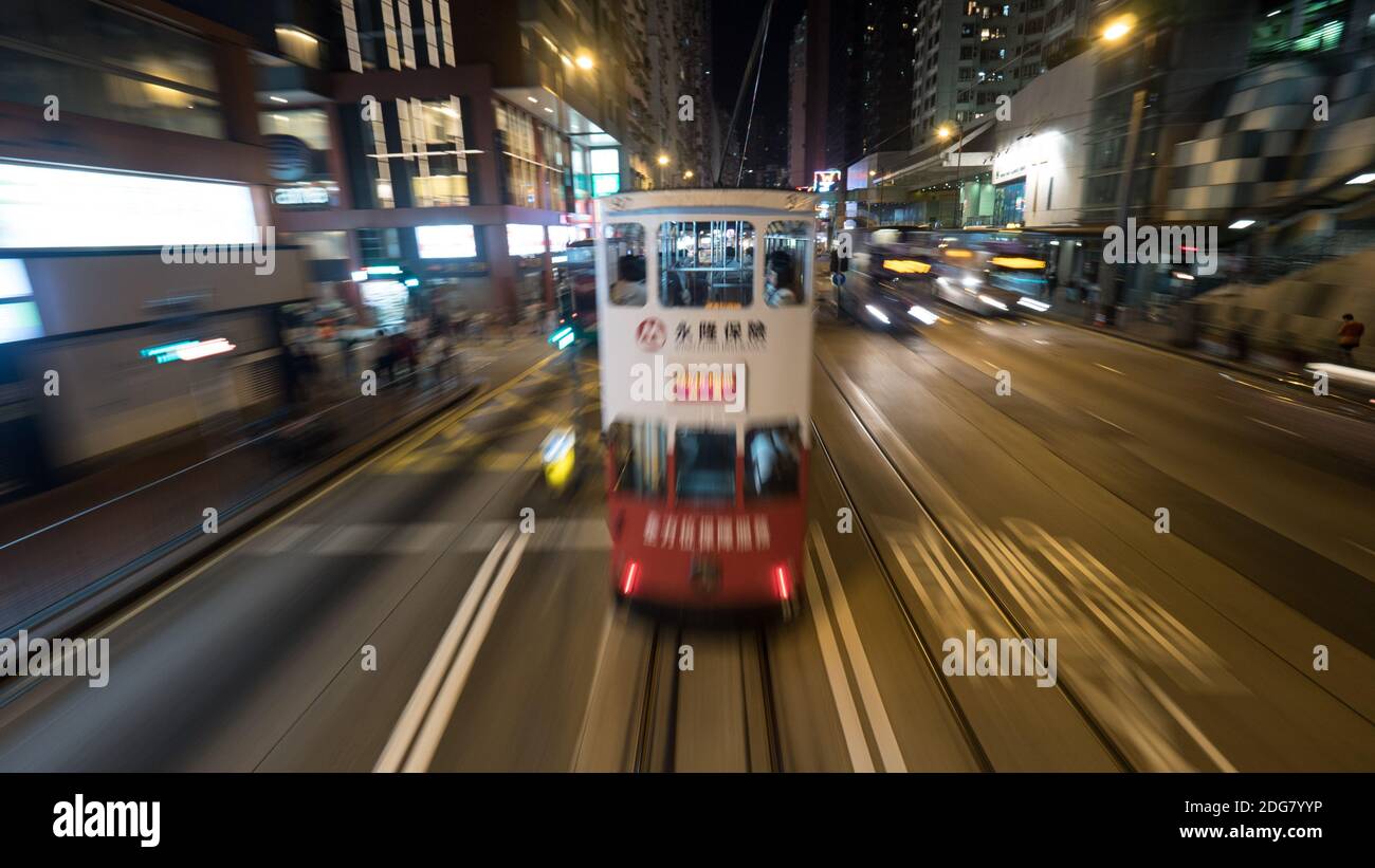 Double-decker tram and buses in night Hong Kong Stock Photo - Alamy