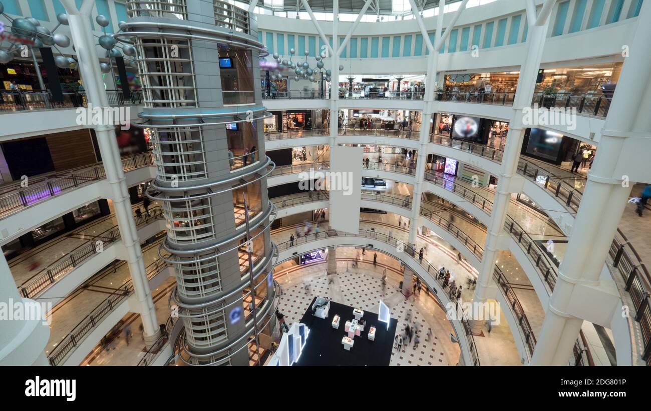 Multistorey shopping mall with customers Stock Photo - Alamy