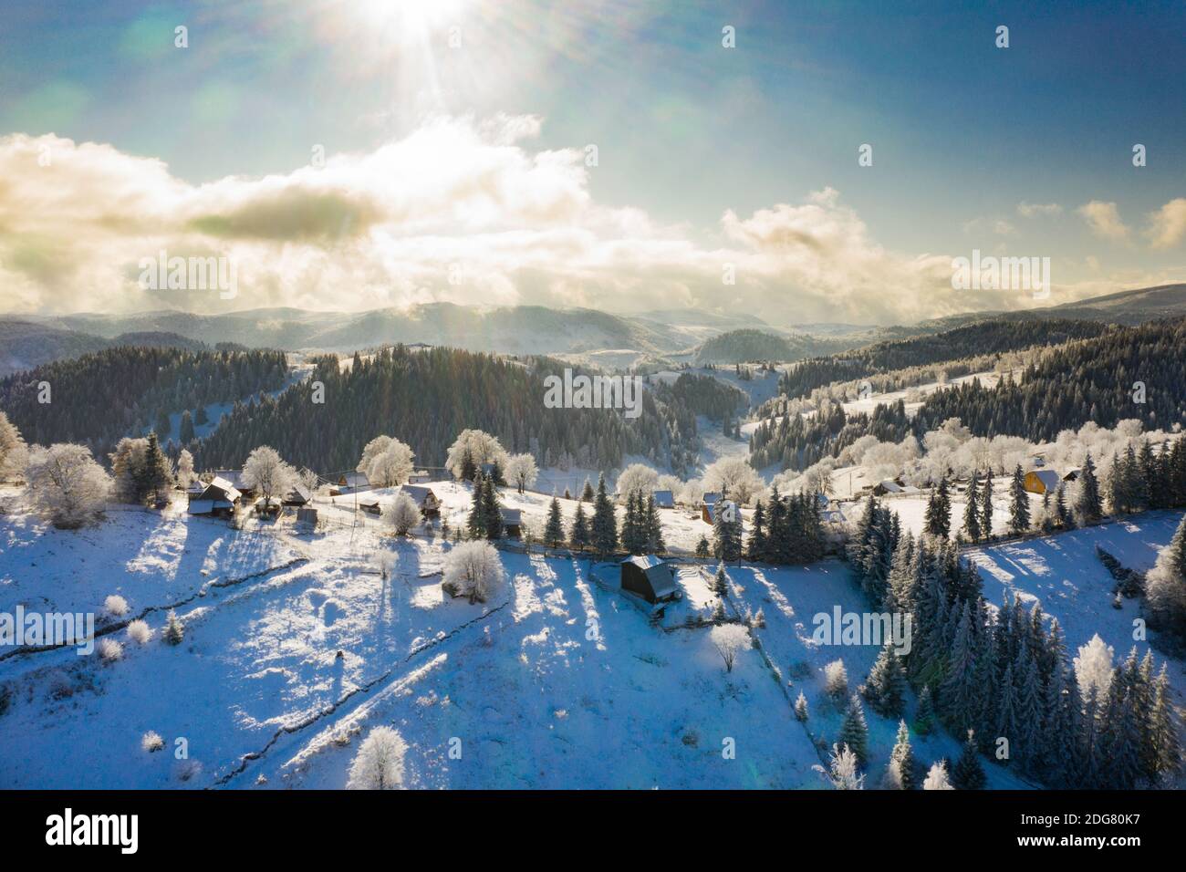 Aerial view of idyllic winter landscape with frozen trees in ...