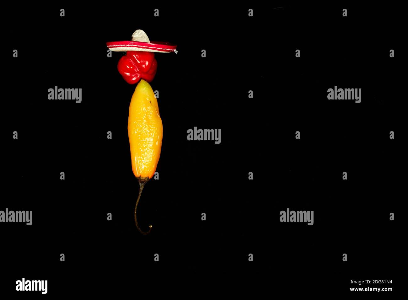 Vegetable chilli, chile face on black backgroung Stock Photo - Alamy