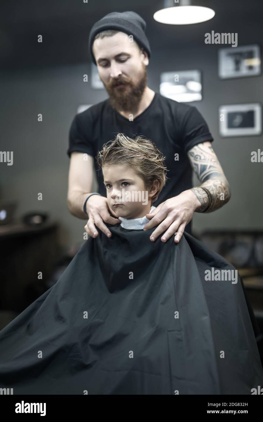 Little kid in barbershop Stock Photo - Alamy