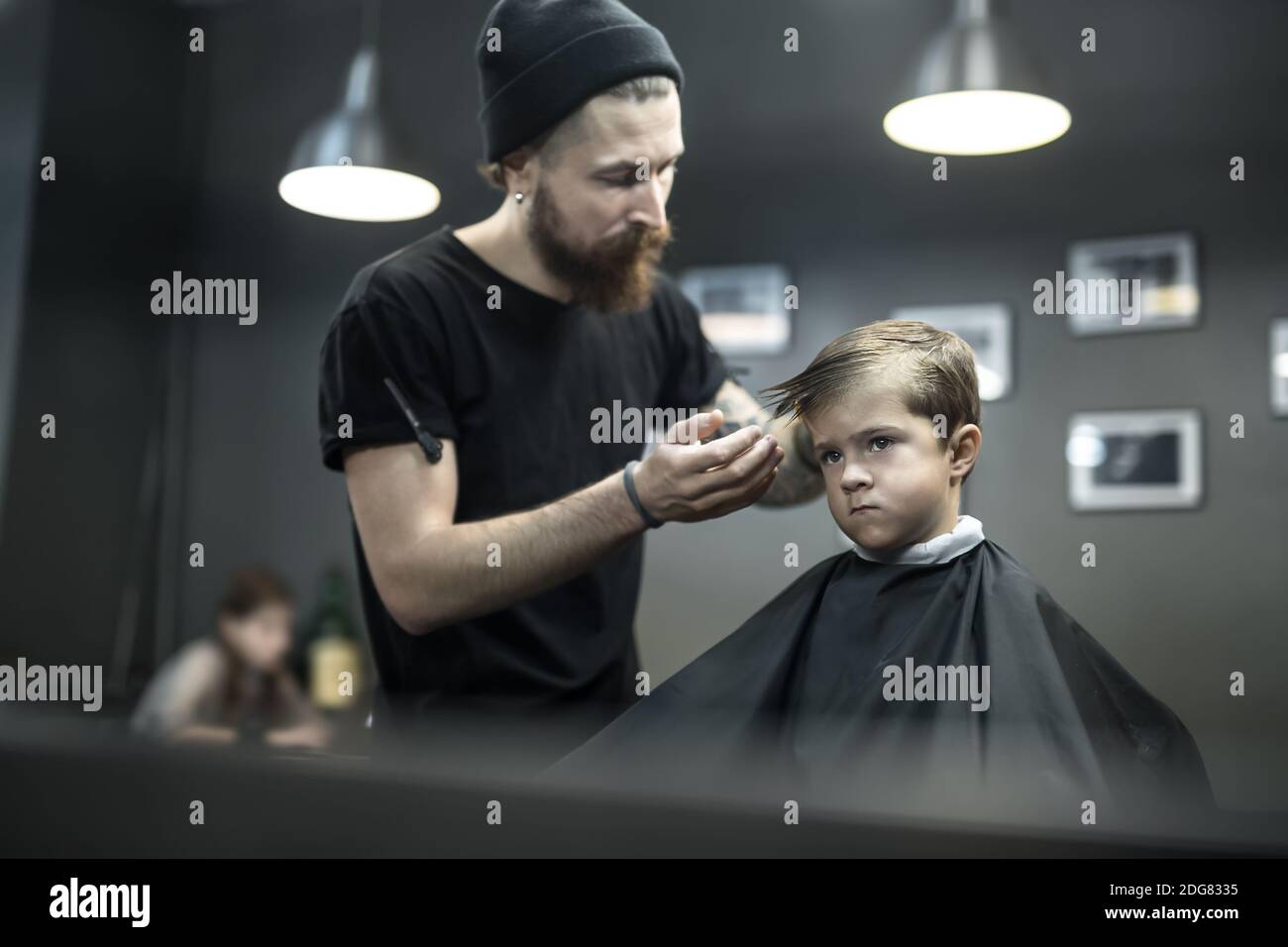 Kid's hair styling in barbershop Stock Photo - Alamy