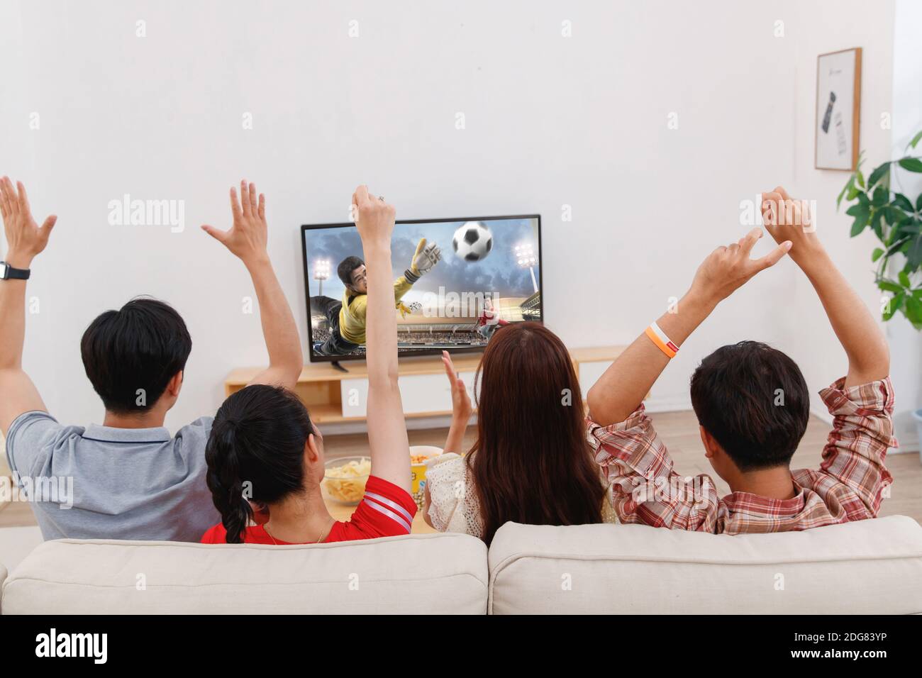 Rear view friends watching game hi-res stock photography and images - Alamy